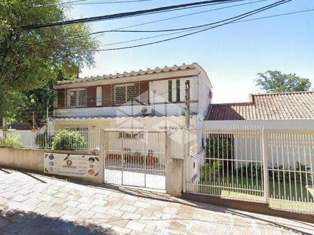 Casa 3 dormitórios com 300m² no Bairro Chácara das Pedras, Porto
