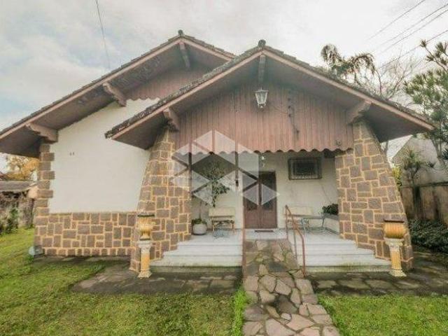 Casa 3 dormitórios à venda Avenida Heitor Vieira, Belém Novo
