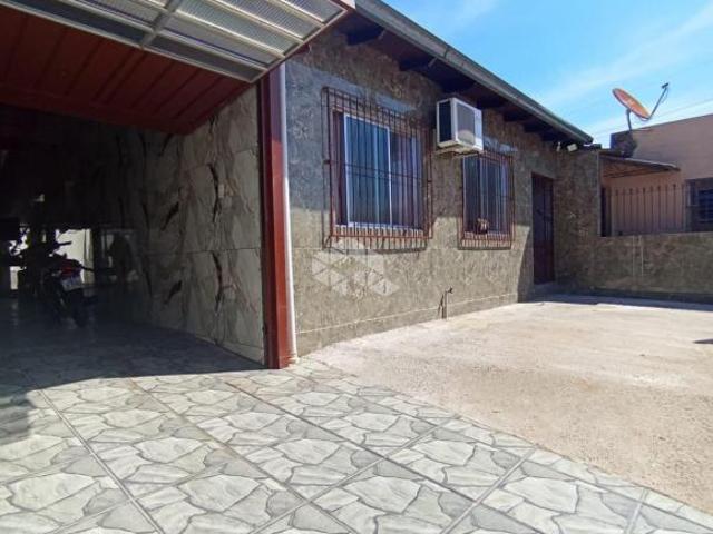Casa 3 dormitórios à venda Guajuviras Canoas