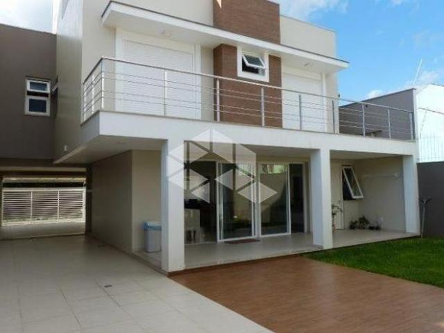 Casa 3 dormitorios amplo patio 4 vagas