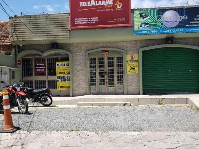 Casa 3 dormitórios e 3 lojas comerciais no bairro Passo da areia Porto Alegre RS