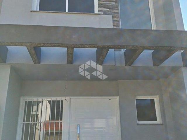 Casa 3 dormitórios no bairro Guarujá