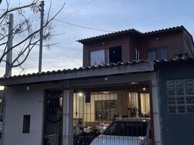 Casa 3 dormitórios no Bairro Ponta Grossa