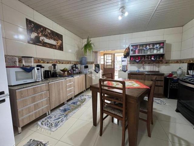 Casa 3 dormitórios sendo 1 suíte, semimobiliada, 2 vagas de garagem coberta, Estância Velha/Canoas/R