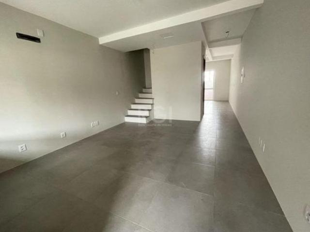 Casa 3 dormitórios, sendo 1 suites, 2 vagas Guarujá, Porto Alegre RS