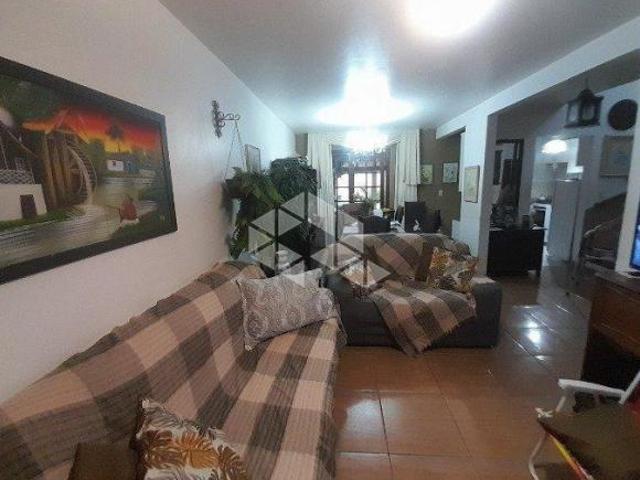 Casa 3 dormitórios para venda no Jardins do Prado bairro Hípica em Porto Alegre/RS