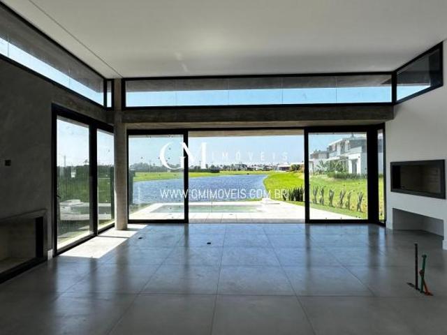 Casa 3 suítes no Reserva das Águas, fundo lago com piscina Torres/RS