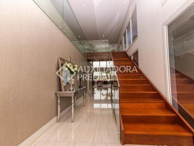 Casa 3 quartos 3 suíte em condomínio Canoas/RS
