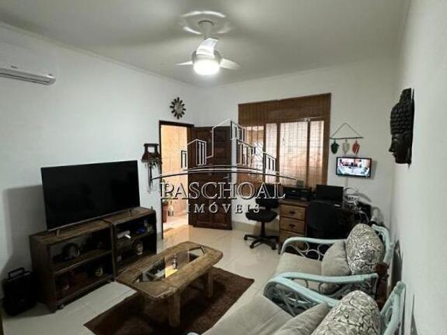 CASA 3 QUARTOS COM 1 SUÍTE, SOLÁRIO E 2 VAGAS NA GUILHERMINA EM PRAIA GRANDE