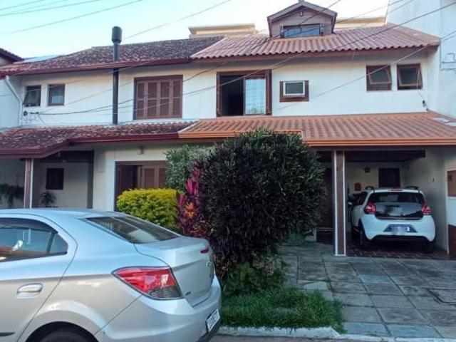 Casa 3 quartos sendo 1 suíte em condomínio no bairro Cavalhada