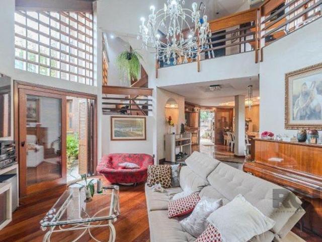 Casa 400m² 5 dormitórios, 4 vagas no bairro Vila Jardim