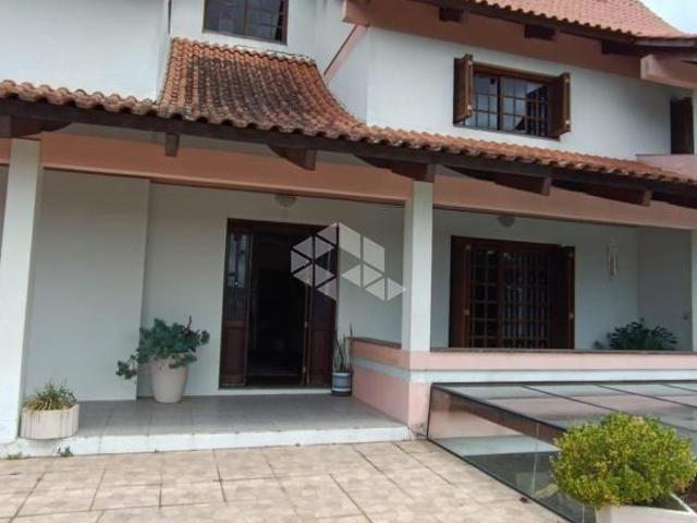 Casa 406m², 3 suítes, piscina, terreno 2.600m² no Nsa Sra de Fátima