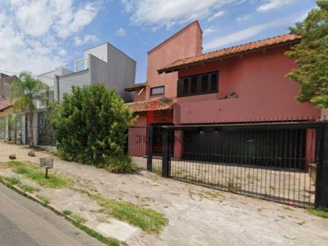 Casa 4 dormitórios no bairro Chacara das Pedras