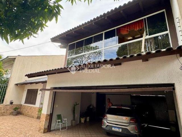 Casa 4 dormitórios 350m2 privativos 3 vagas de garagem no bairro Jardim Planalto