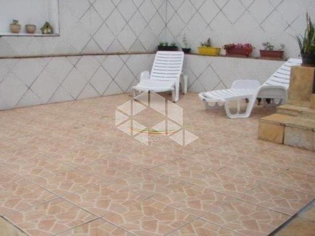 Casa 4 dormitórios com vaga de garagem no Bairro Jardim Lindóia