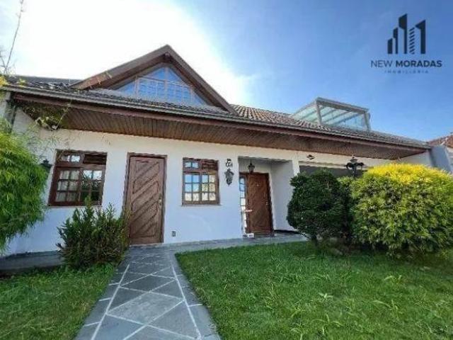 Casa 4 dormitórios à venda, 390 m² Jardim Botânico
