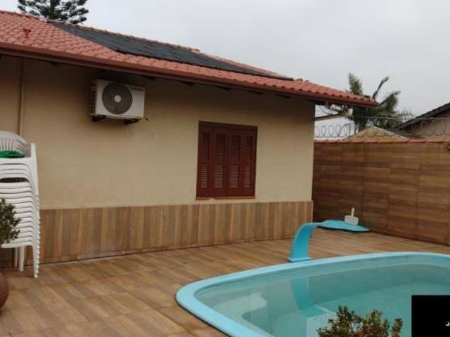 Casa 4 Dormitórios á venda em Tramandaí Bairro Zona Nova