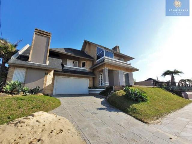 Casa 4 dormitórios a beira mar de Atlântida