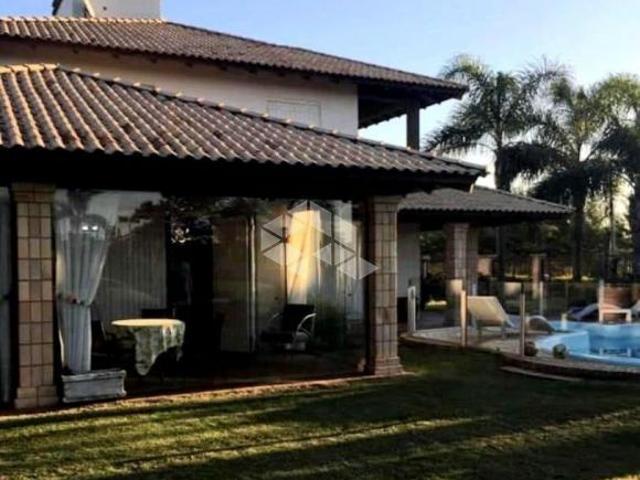 Casa 4 Dormitórios Atlântida
