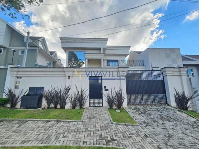 Casa 4 dormitórios no Thereza Glaser com piscina