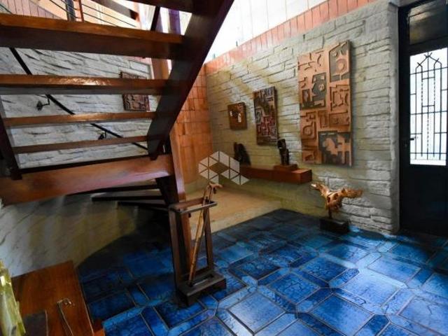 Casa, 4 dormitórios, sendo uma suíte no bairro Três Figueiras