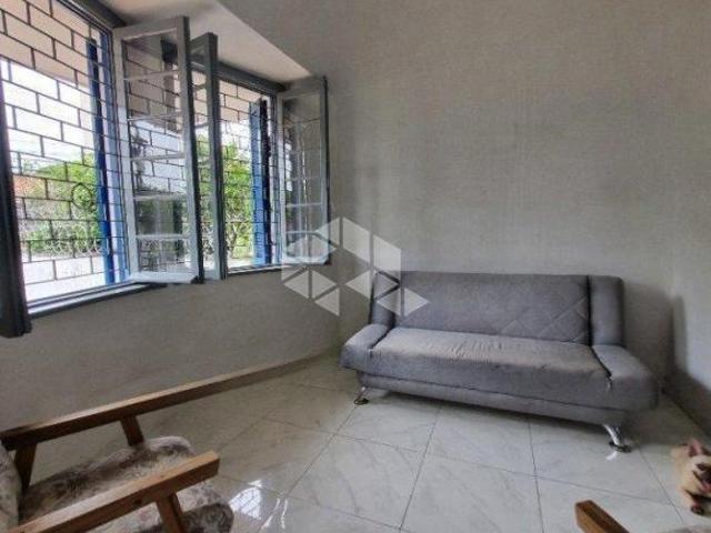 Casa 4 dormitórios, pátio e garagem no bairro Partenon em Porto Alegre