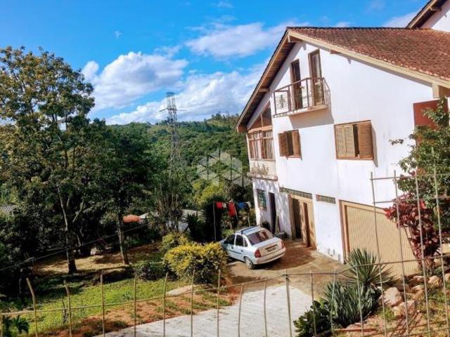 Casa 4 dormitórios/quartos Bairro Vila Nova