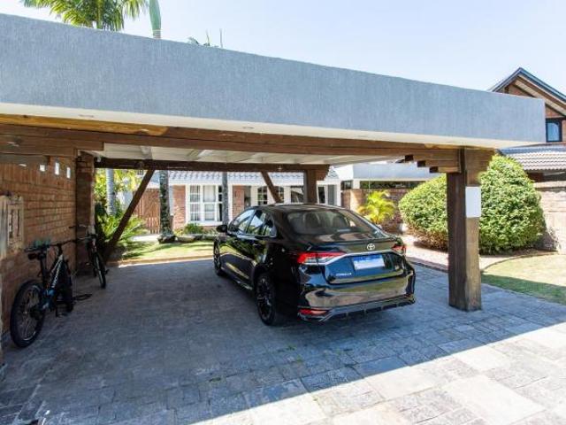 Casa 4 suites no Terra Ville, com home office, estar íntimo, 4 vagas e piscina