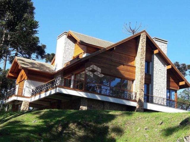 Casa 4 suítes, 444,76m² privativos, no condomínio de alto padrão de Gramado