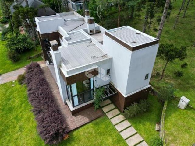 Casa 4 suítes, 518,43m² privativos, no Condomínio Aspen Mountain, em Gramado