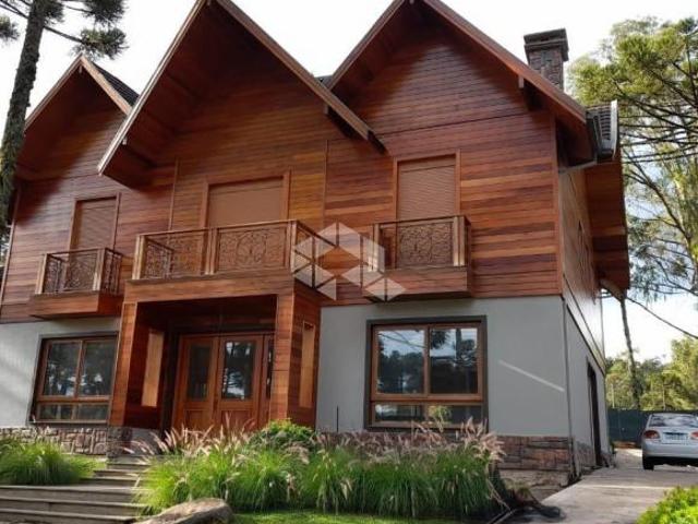 Casa 4 suítes, 518,43m² privativos, no Condomínio Aspen Mountain, em Gramado