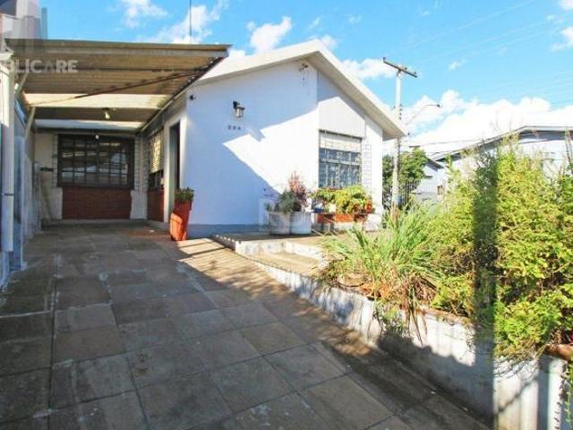 Casa 5 dormitórios, 1 suíte, 2 vagas de garagem, no bairro Camaquã, Poa/RS