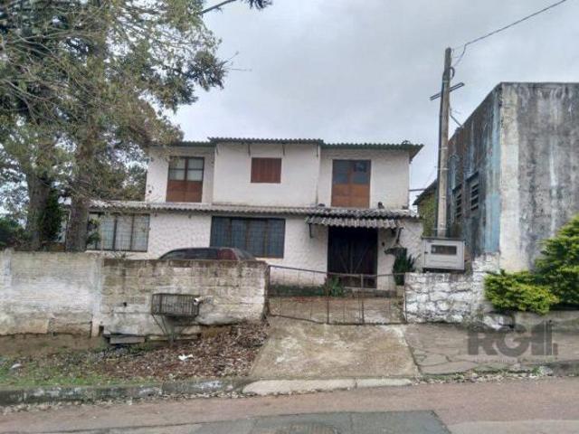 Casa 5 dormitórios, bairro Camaquã