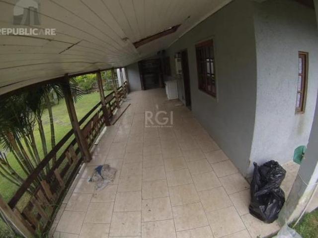 Casa 5 dormitórios no bairro Ponta Grossa