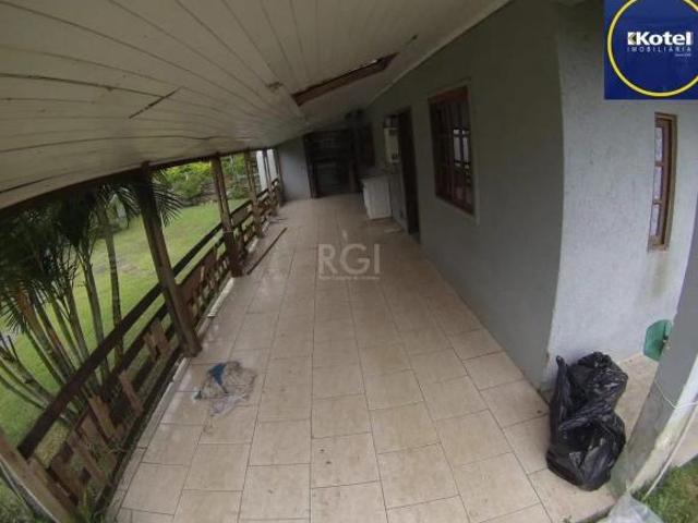 Casa 5 dormitórios no bairro Ponta Grossa
