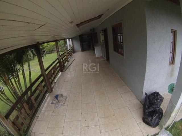 Casa 5 dormitórios no bairro Ponta Grossa