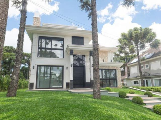 Casa 5 suítes, 371m² privativos, no Condomínio Aspen Mountain, em Gramado