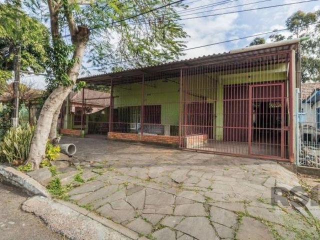 Casa 6 dormitórios no bairro Jardim Floresta