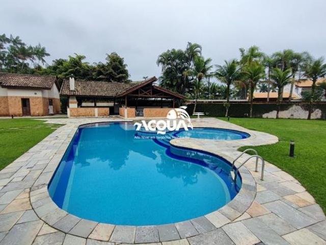 Casa 6 suítes condomínio Jardim Acapulco Guarujá