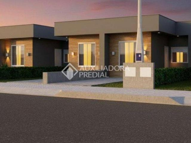 Casas na planta na cidade de Portão