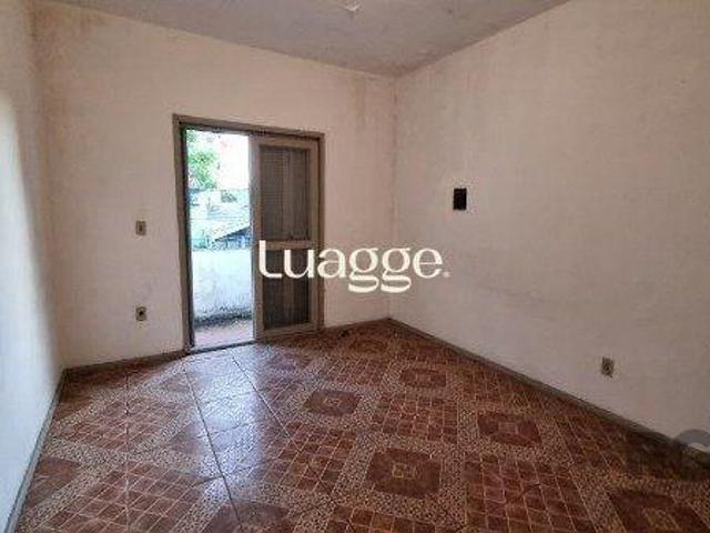 Casa/Sobrado com apartamento e loja, estacionamento, a venda no Bairro Jardim I