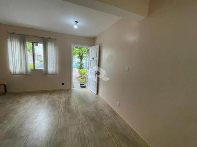 Casa/sobrado em condomínio, 3 dormitórios/quartos, com vaga de garagem no Bairro Humaitá, em Porto