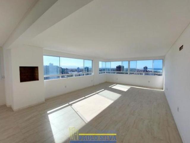 Centro de Tramandaí e a poucos passos do mar. Apartamento novo, trê