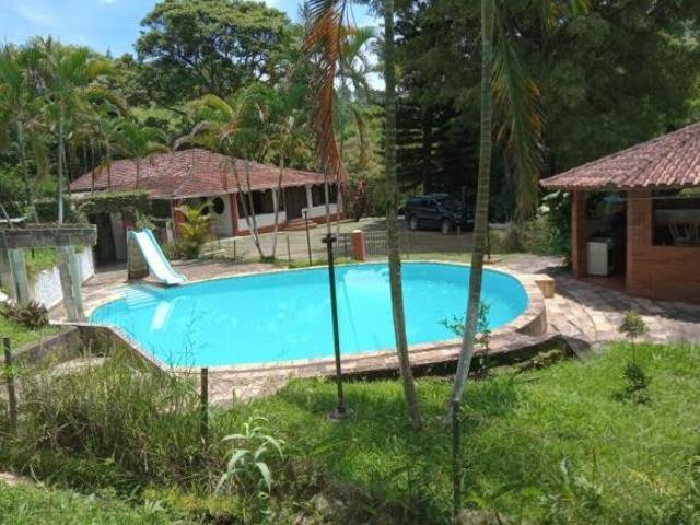 Chácara com 4 dormitórios à venda, 12000 m² por R$ 1.200.000,00 Canaã Jambeiro/SP