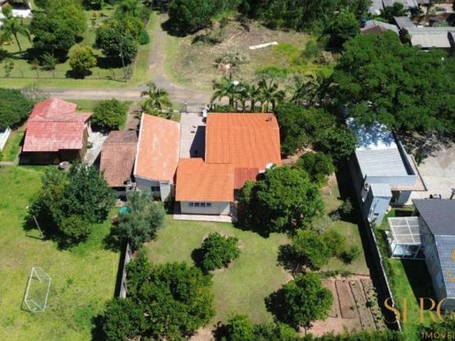 CHÁCARA COM 1.180 M2 COM CASA NO INTERIOR DE TRIUNFO RS A 100 MT DO ASFALTO