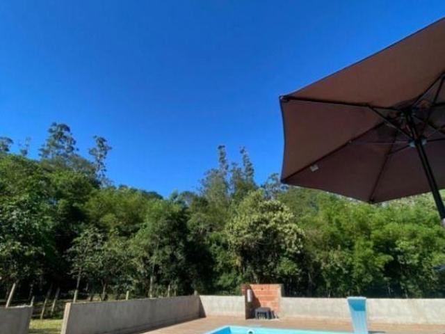 Chácara com 2 dormitórios à venda, 17000 m² por R$ 770.000 Zona Rural Monteiro Lobato/SP