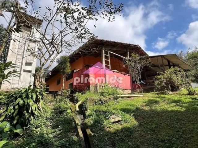 Chácara com 2 dormitórios à venda, 2800 m² por R$ 850.000,00 Enseada São Sebastião/SP