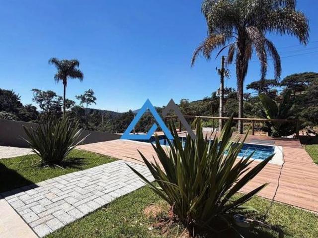 CHÁCARA COM PISCINA À VENDA EM ATIBAIA – VISTA PARA ÁREA VERDE E FINO ACABAMENTO