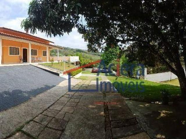 CHÁCARA RESIDENCIAL EM CONDOMÍNIO IMPECÁVEL