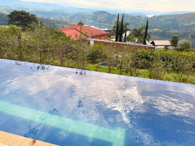 CHÁCARA, VISTA PANORAMICA PARA A REPRESA, COM CASA TERREA, MODERNA E ACONCHEGANTE, NO CONDOMÍNI